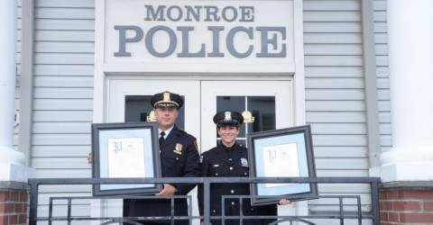 Monroe honors police chief, officer for recent achievements