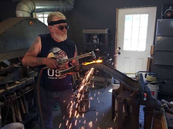 Local blacksmith remembers fallen heroes for Brooklyn memorial
