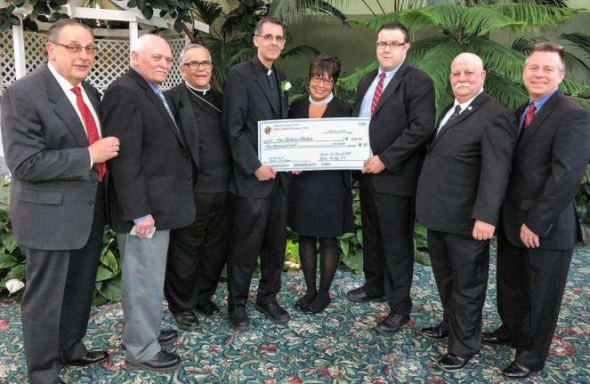 Monroe Knights of Columbus congratulates Sacred Heart Outreach