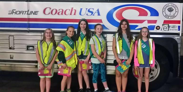 A 'Girl Scout journey' to the bus facility